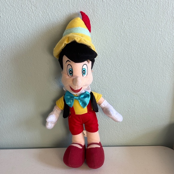 Disney | Toys | Pinocchio Plush Toy With Red And Yellow Outfit | Poshmark